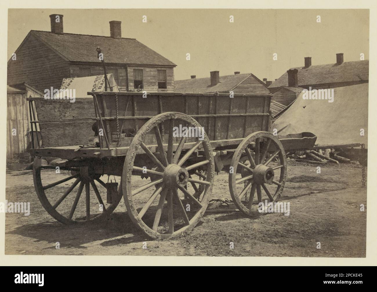 Supply wagon, probably in a Civil War military facility. Title devised by Library staff. Carts ...