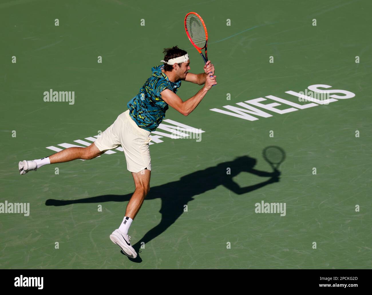 Indian Wells, California, USA. March 13, 2023 Taylor Fritz returns a ...