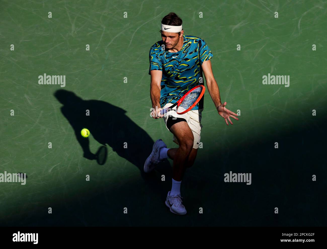 Indian Wells, California, USA. March 13, 2023 Taylor Fritz returns a ...