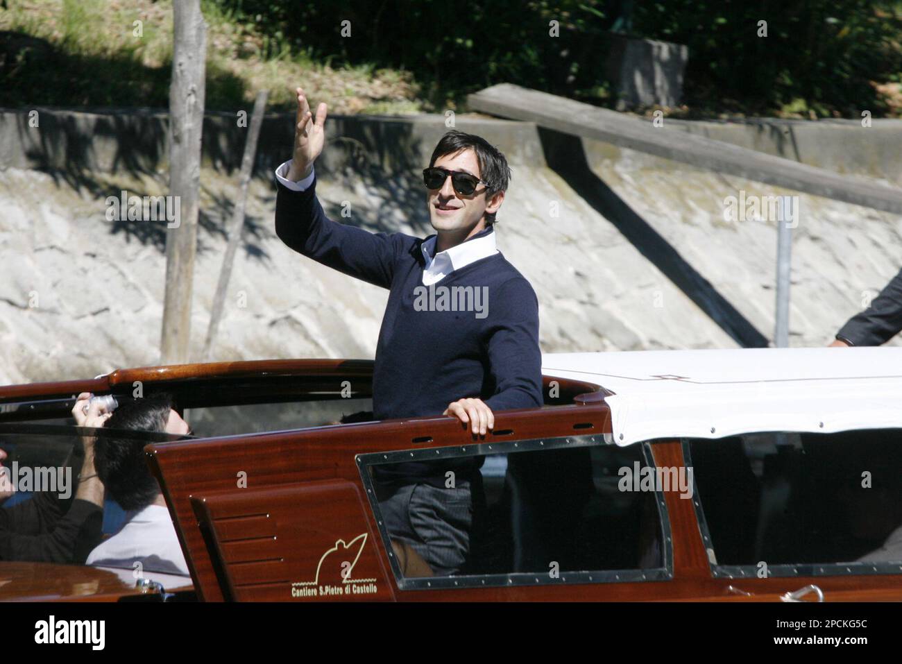 US actor Adrien Brody waves from a boat after presenting the movie ...