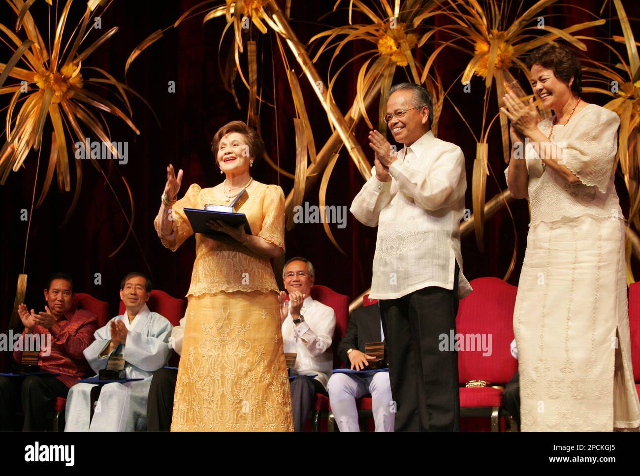 Philippines' Eugenia Duran Apostol, front left, this year's Ramon ...