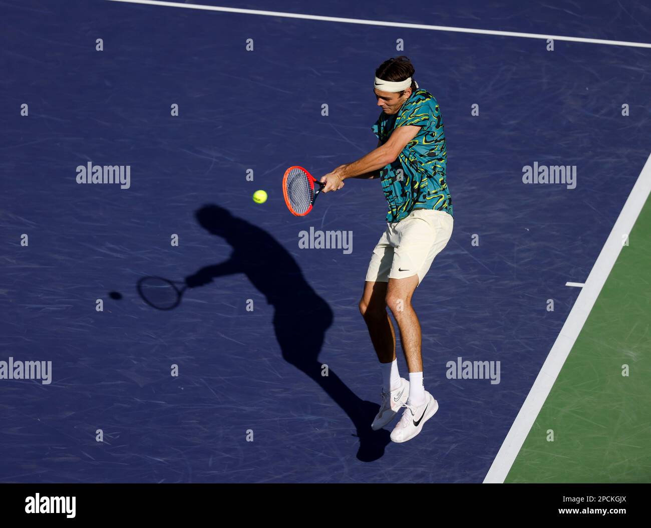 Indian Wells, California, USA. March 13, 2023 Taylor Fritz returns a ...