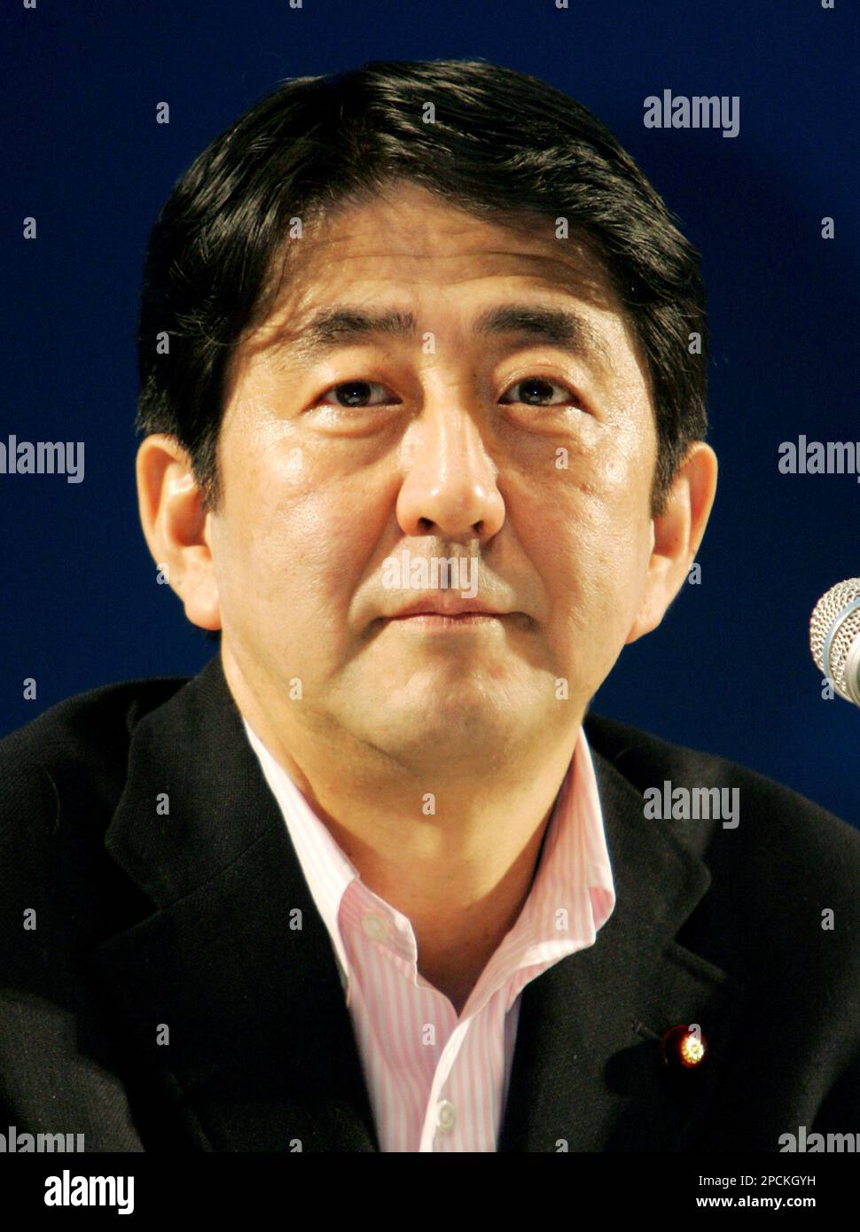 Japan's Chief Cabinet Secretary Shintaro Abe attends a town meeting marking the fifth ...