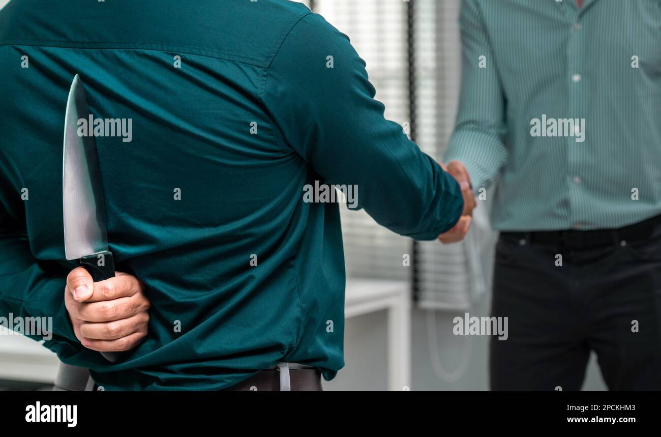 Knife in back hi-res stock photography and images - Alamy