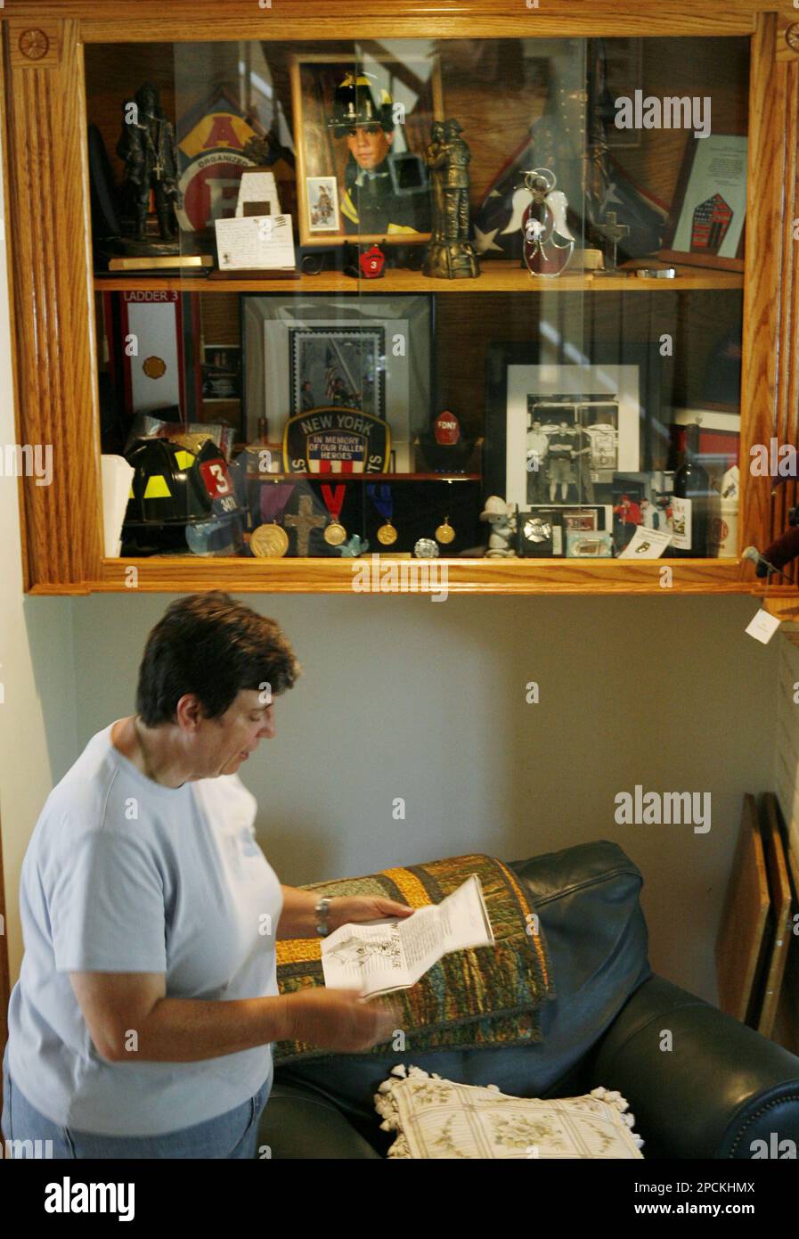 Regina Coyle, whose 27 year-old firefighter son, James Raymond Coyle ...