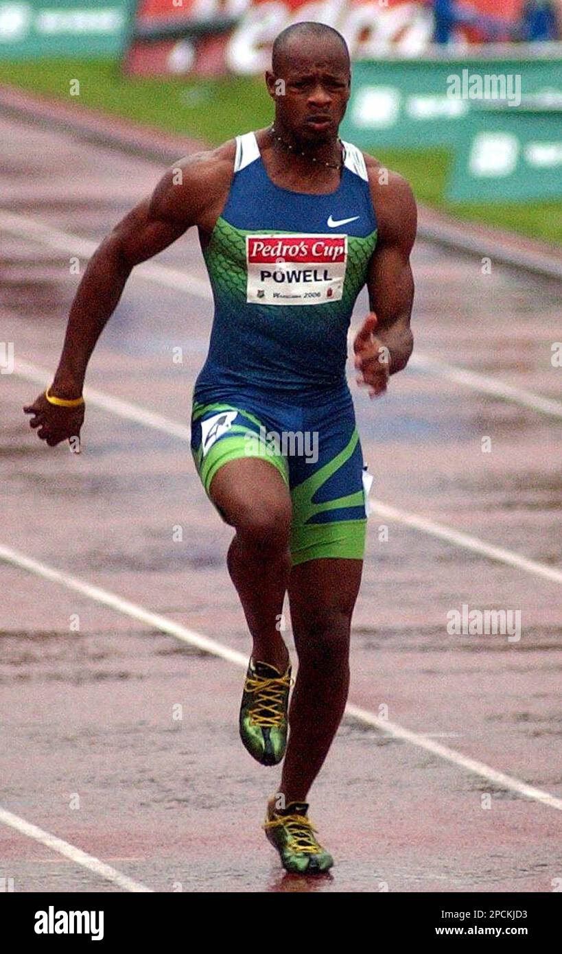 Asafa Powell from Jamaica runs in a men's 100 meters race during the ...