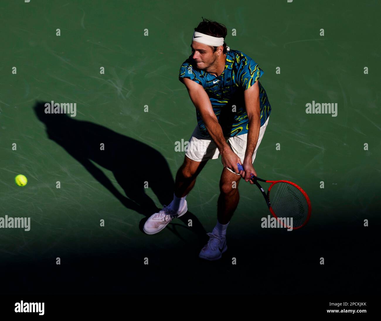 Indian Wells, California, USA. March 13, 2023 Taylor Fritz returns a ...