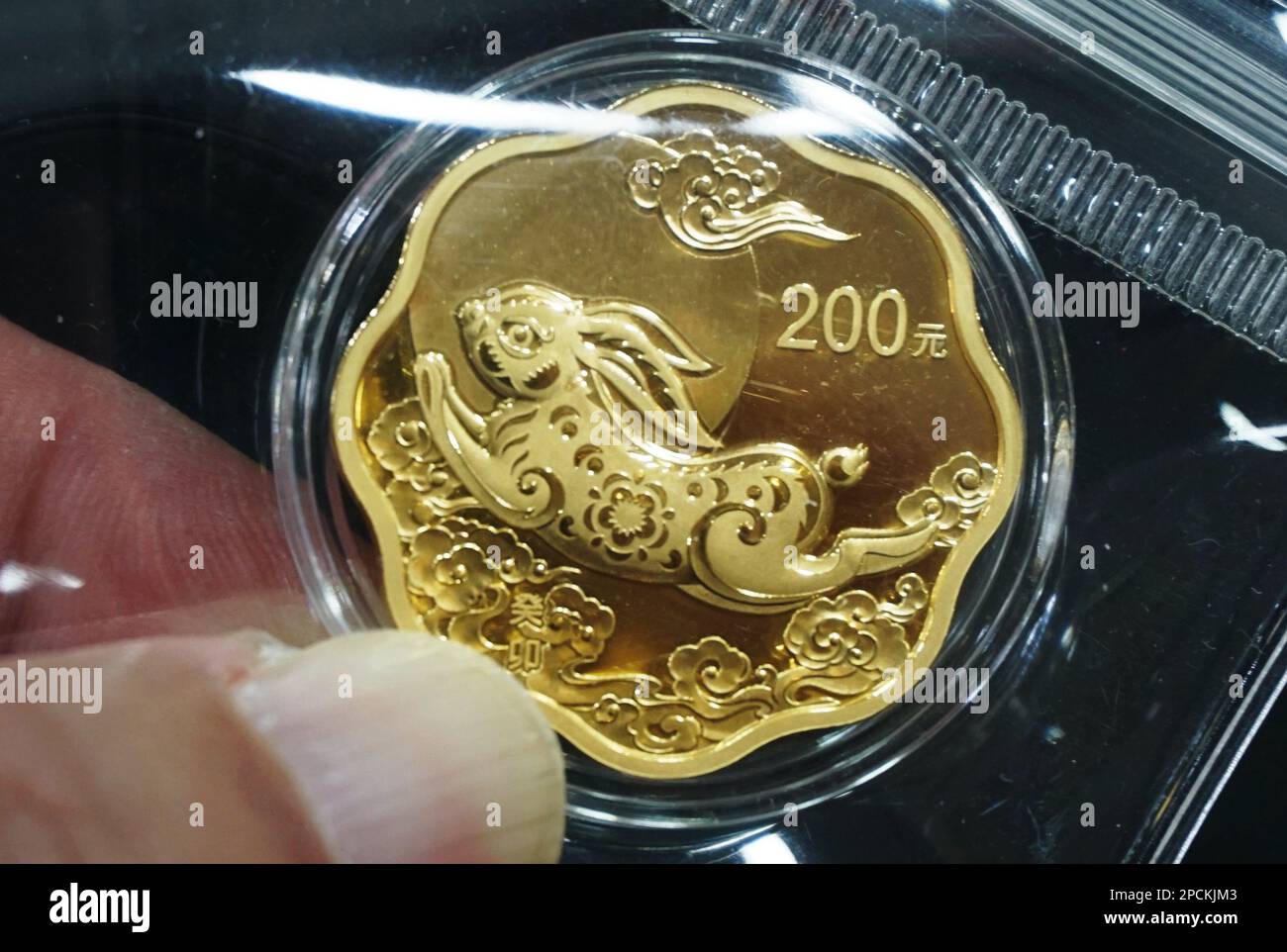 HANGZHOU, CHINA - MARCH 14, 2023 - Gold coins of 2023 Year of the ...