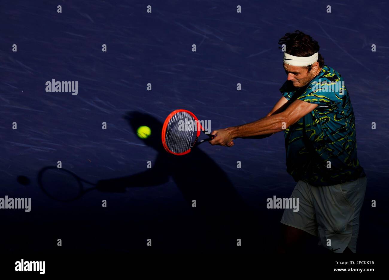 Indian Wells, California, USA. March 13, 2023 Taylor Fritz returns a ...