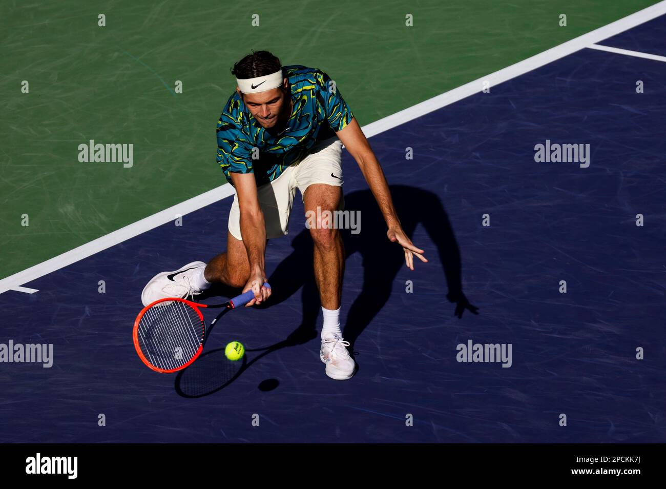 Indian Wells, California, USA. March 13, 2023 Taylor Fritz returns a ...