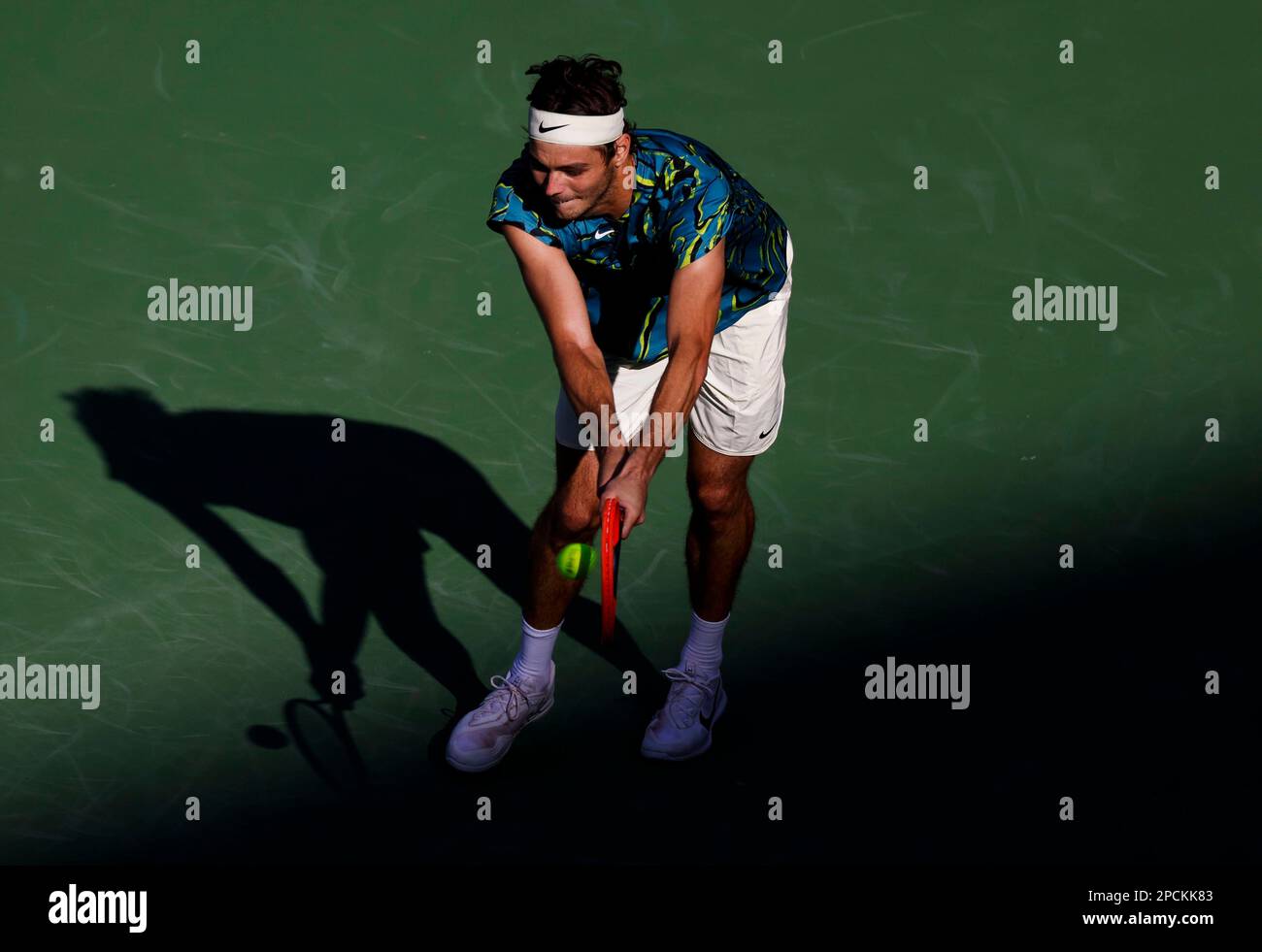 Indian Wells, California, USA. March 13, 2023 Taylor Fritz returns a ...