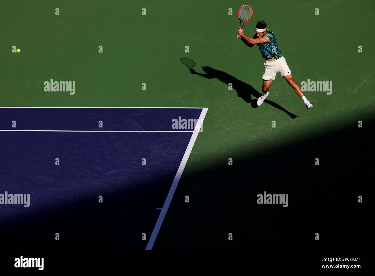Indian Wells, California, USA. March 13, 2023 Taylor Fritz returns a ...