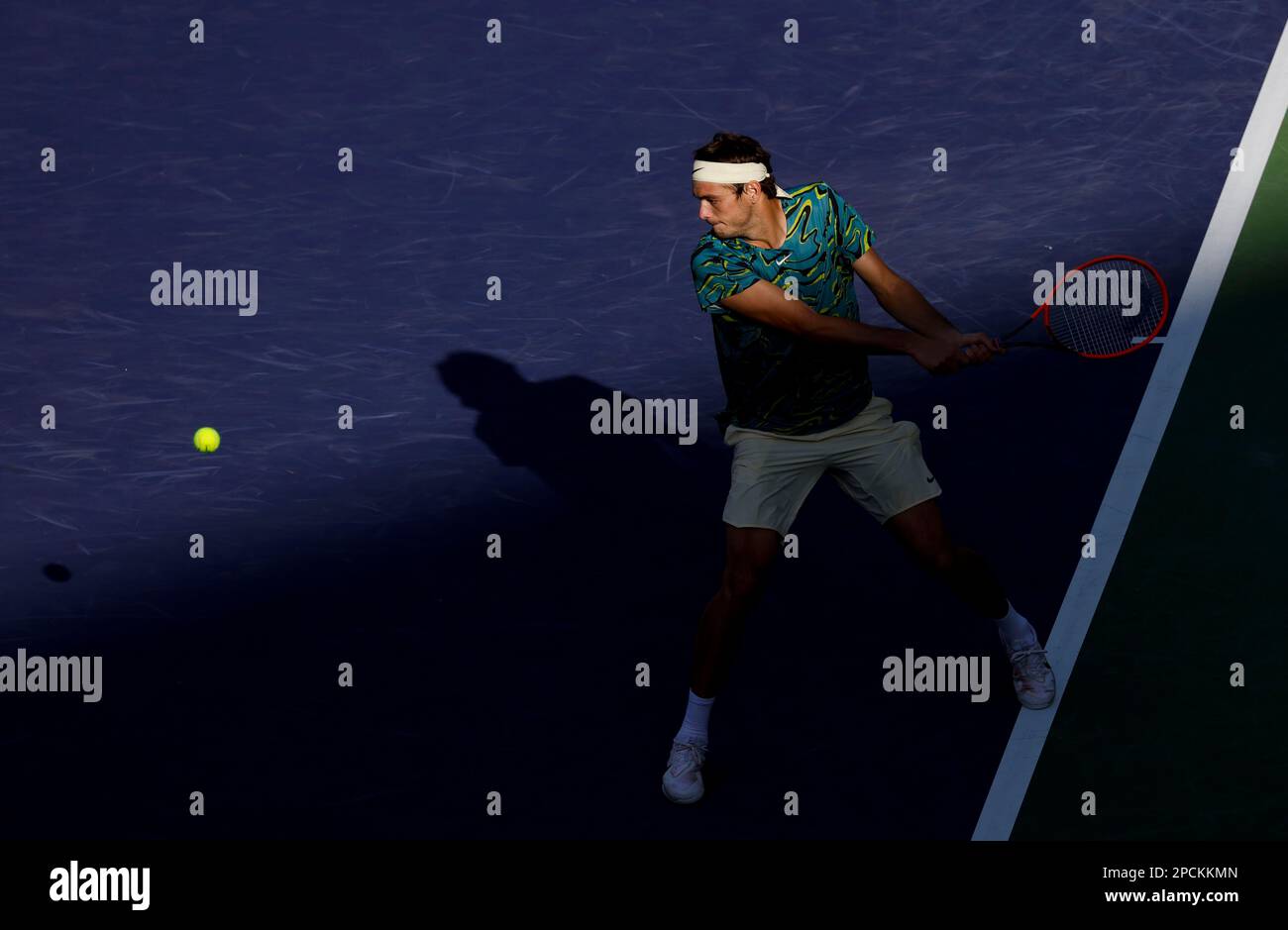 Indian Wells, California, USA. March 13, 2023 Taylor Fritz returns a ...