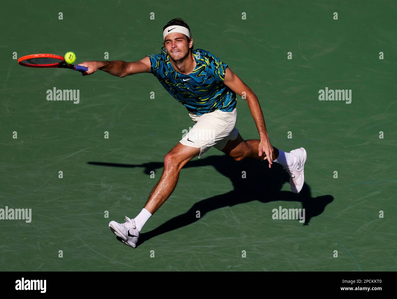 Indian Wells, California, USA. March 13, 2023 Taylor Fritz returns a ...
