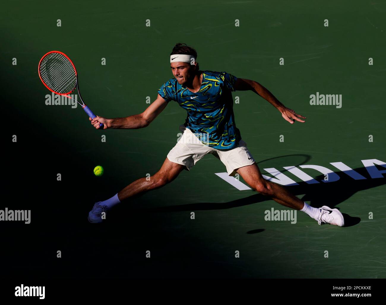 Indian Wells, California, USA. March 13, 2023 Taylor Fritz returns a ...