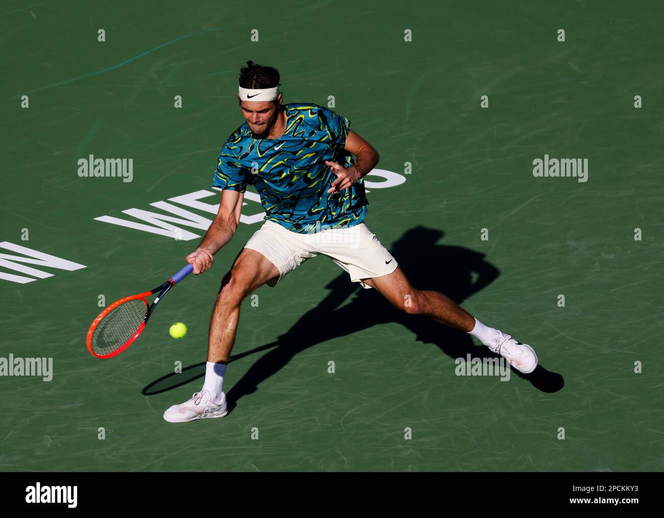 Indian Wells, California, USA. March 13, 2023 Taylor Fritz returns a ...