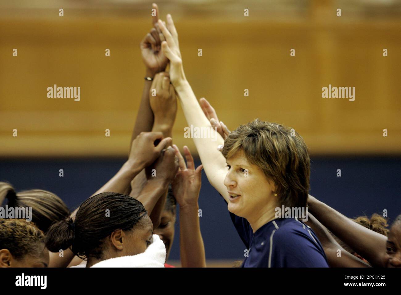 Team USA coach Anne Donovan of the Seattle Storm comes together with ...