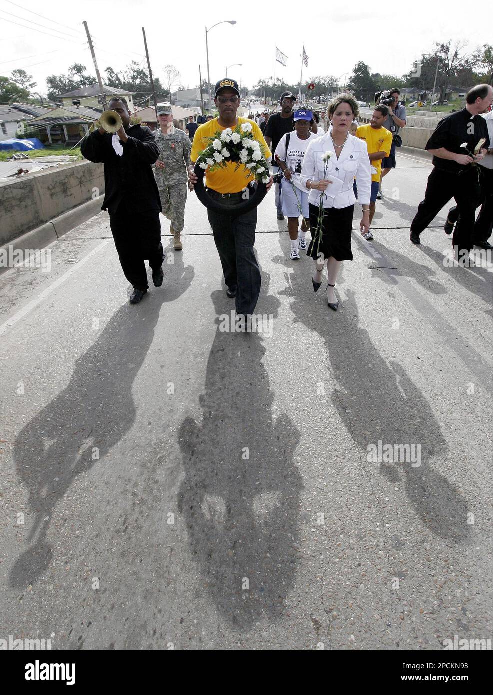 New Orleans City Council member Cynthia Willard-Lewis, right walks with ...