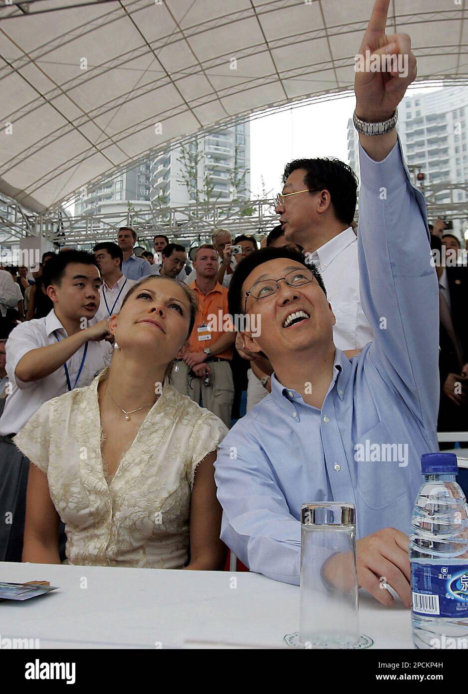 Swedish Crown Princess Victoria, left, and Shanghai Mayor Han Zheng, right, chat during the ...