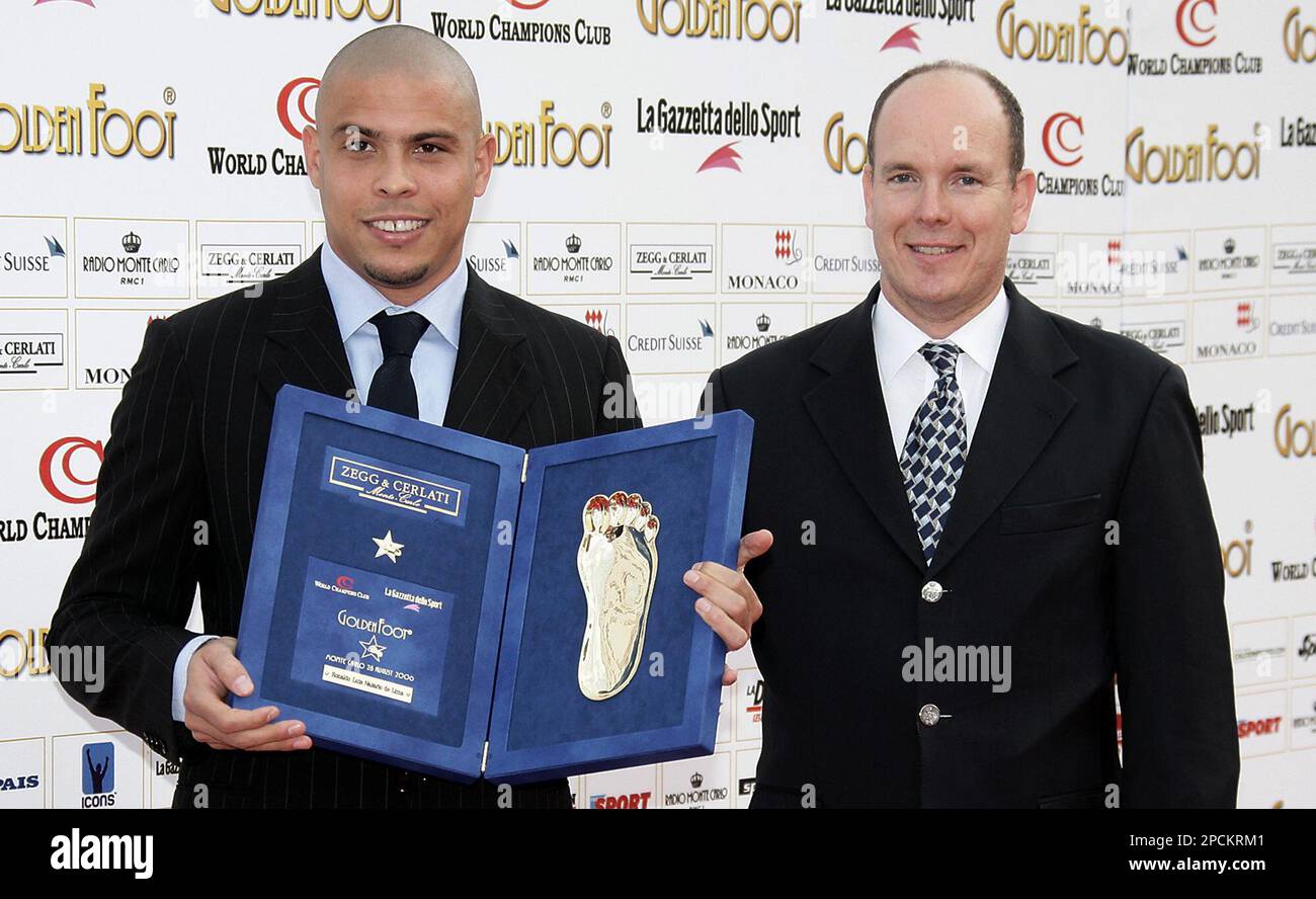Prince Albert II of Monaco, right, and the 2006 Golden Foot Winner ...