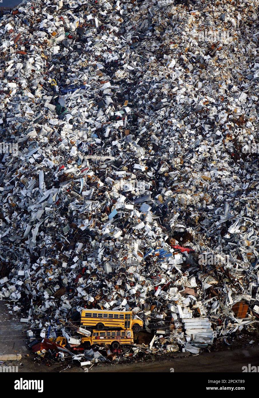 Huge mounds of debris are seen at a waste disposal collection point in ...