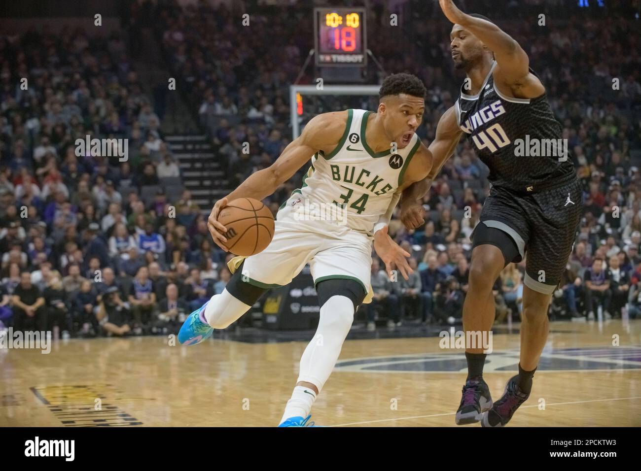 Milwaukee Bucks forward Giannis Antetokounmpo (34) drives past Sacramento Kings forward Harrison ...