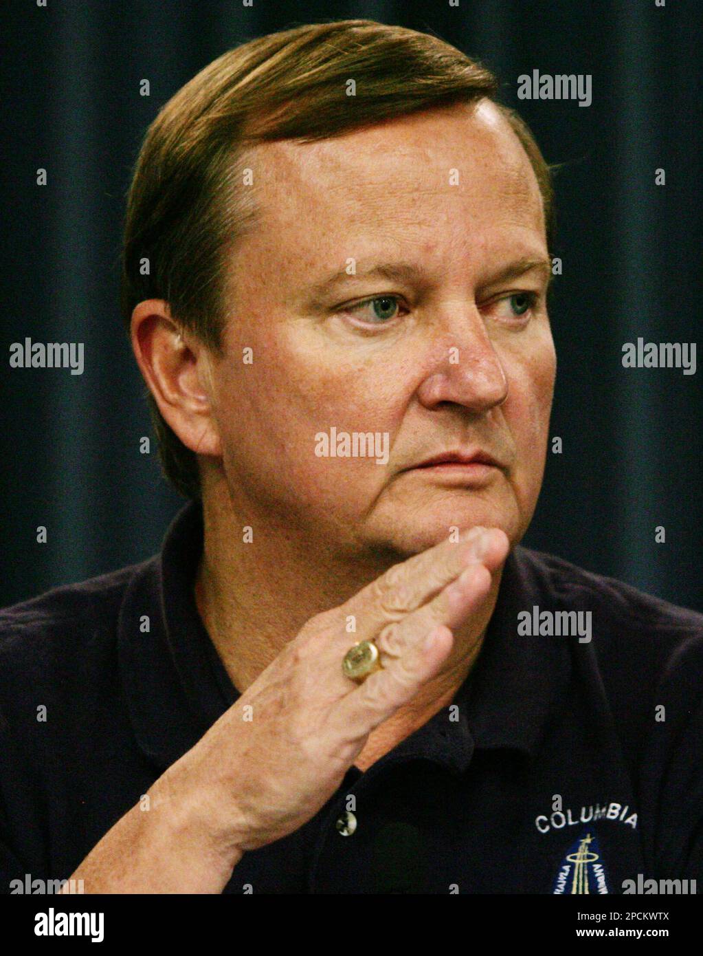 Launch Director Mike Leinbach talks about weather conditions with ...