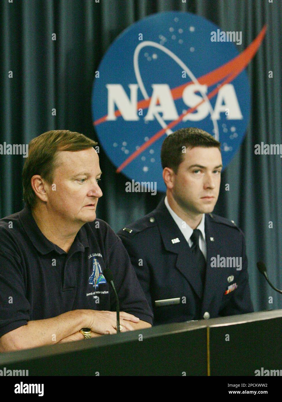 Launch Director Mike Leinbach, left, and weather officer U.S. Air Force ...