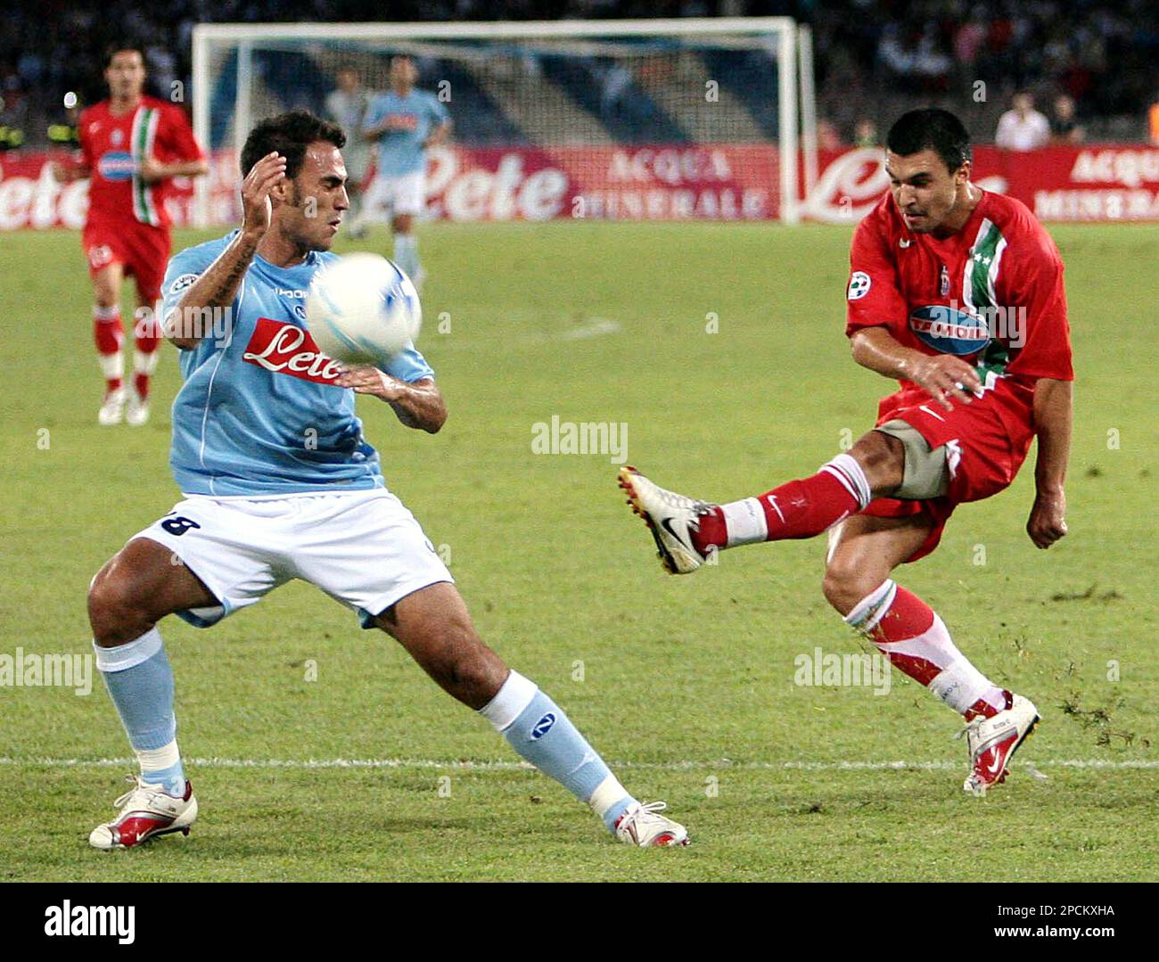 Juventus player Valeri Bojinov, of Bulgaria, right, and Napoli player ...