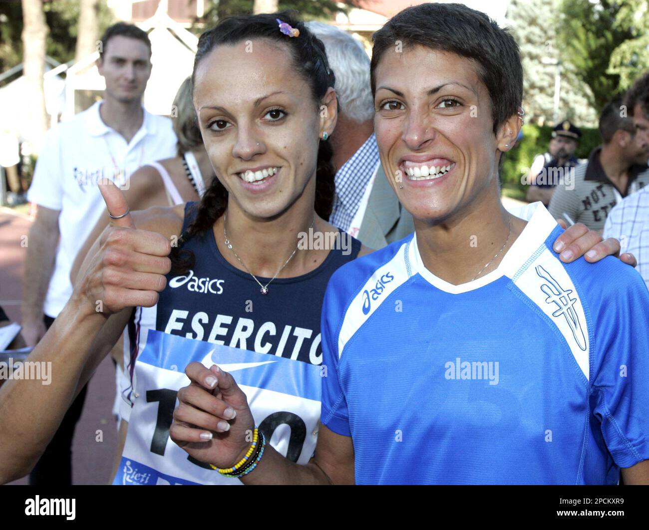 Italy's Elisa Cusma, left, makes a thums up next to Daniela Reina at ...