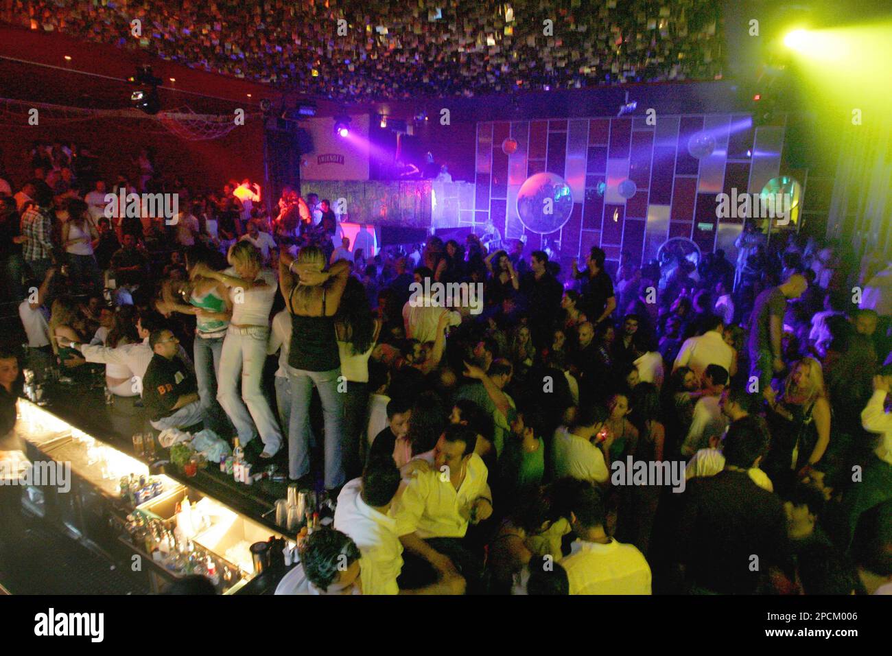 People enjoy themselves in Cristal night club in Beirut, in the early ...