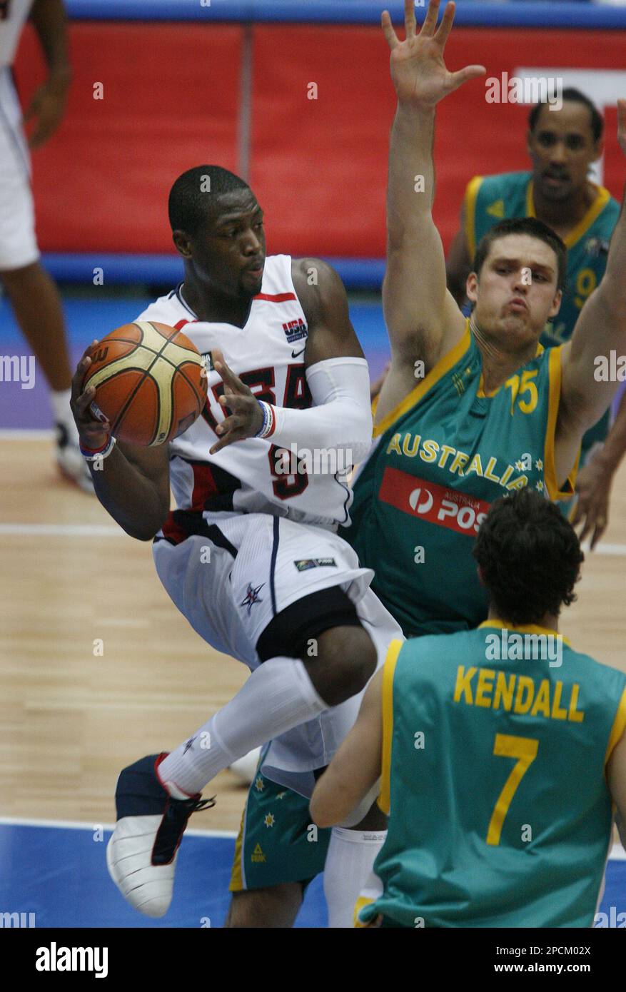 The USA's Dwyane Wade, 9, drives to the basket against Australia's ...
