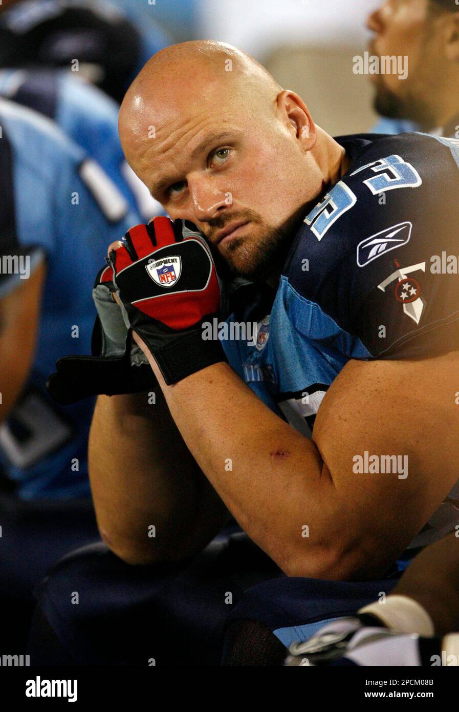 Tennessee Titans defensive end Kyle Vanden Bosch watches the "jumbotron ...
