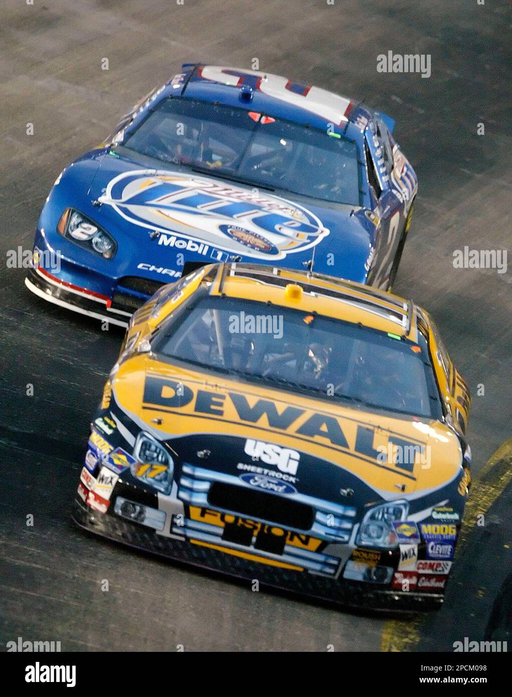Matt Kenseth leads Kurt Busch (2) through a turn during the NASCAR ...