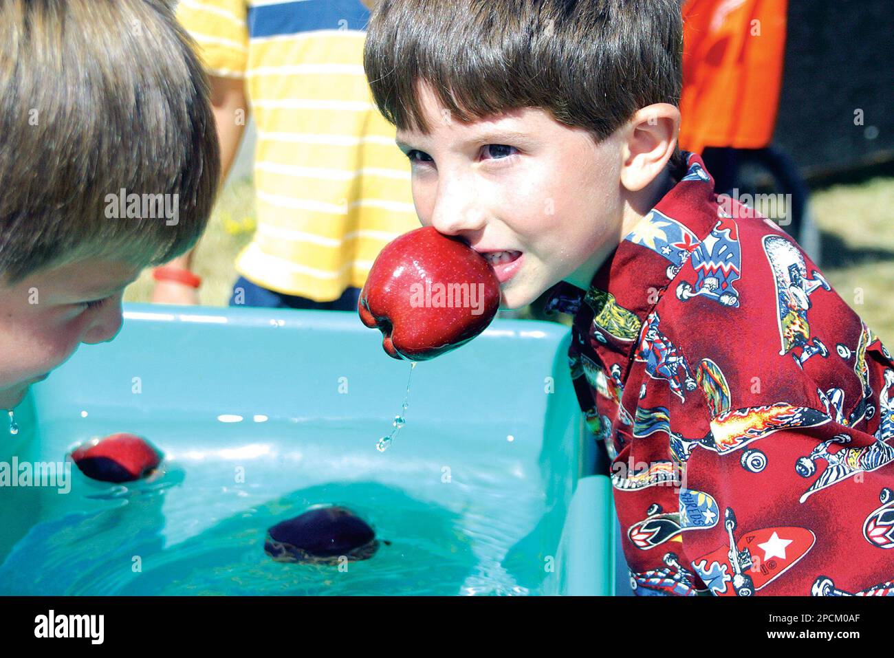 Zack Johnson, 7, of Sandpoint, Idaho, comes up with his booty in the ...