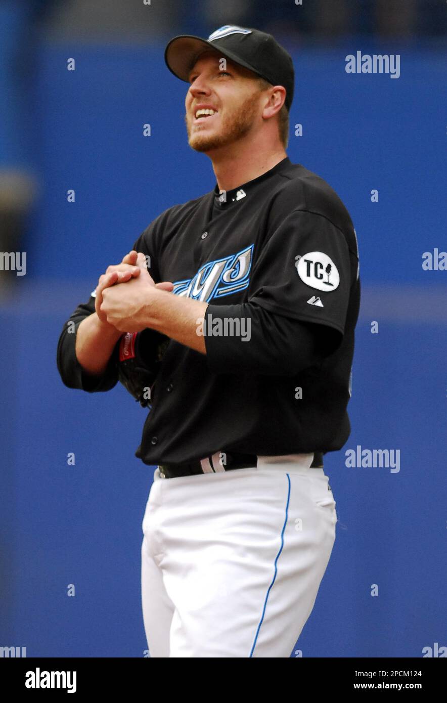 Toronto Blue Jays pitcher Roy Halladay looks on after giving up a solo ...