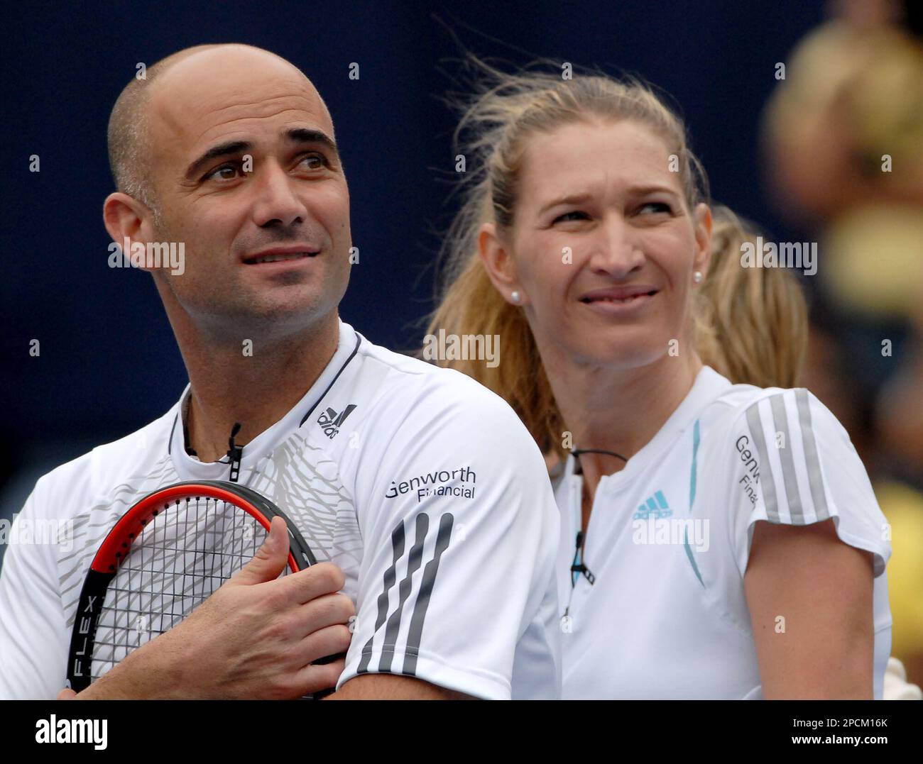 Tennis greats Andre Agassi, left, and his wife Steffi Graf take part in ...