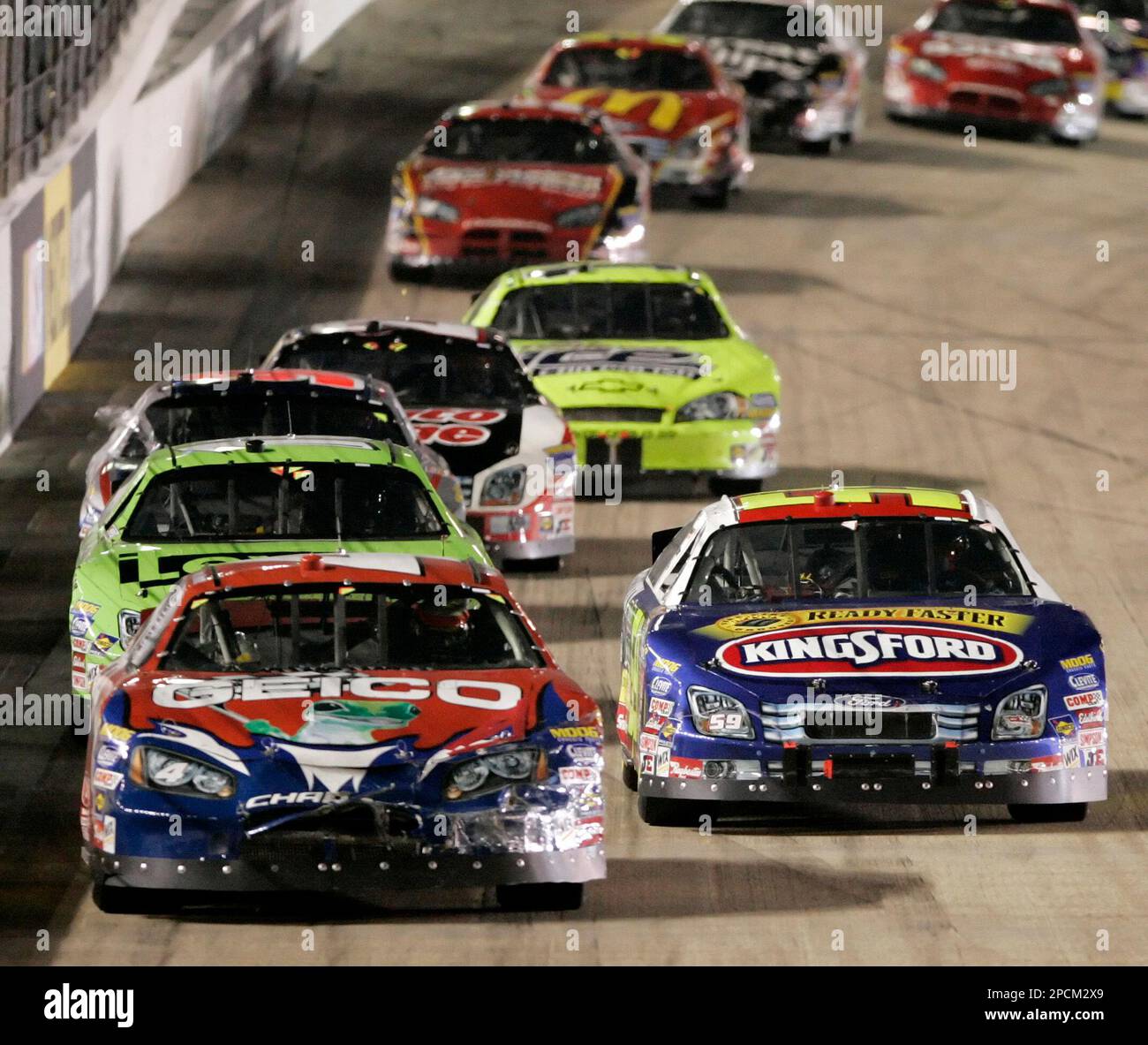 Auggie Vidovich, front left, and Stacy Compton, front right, head down ...