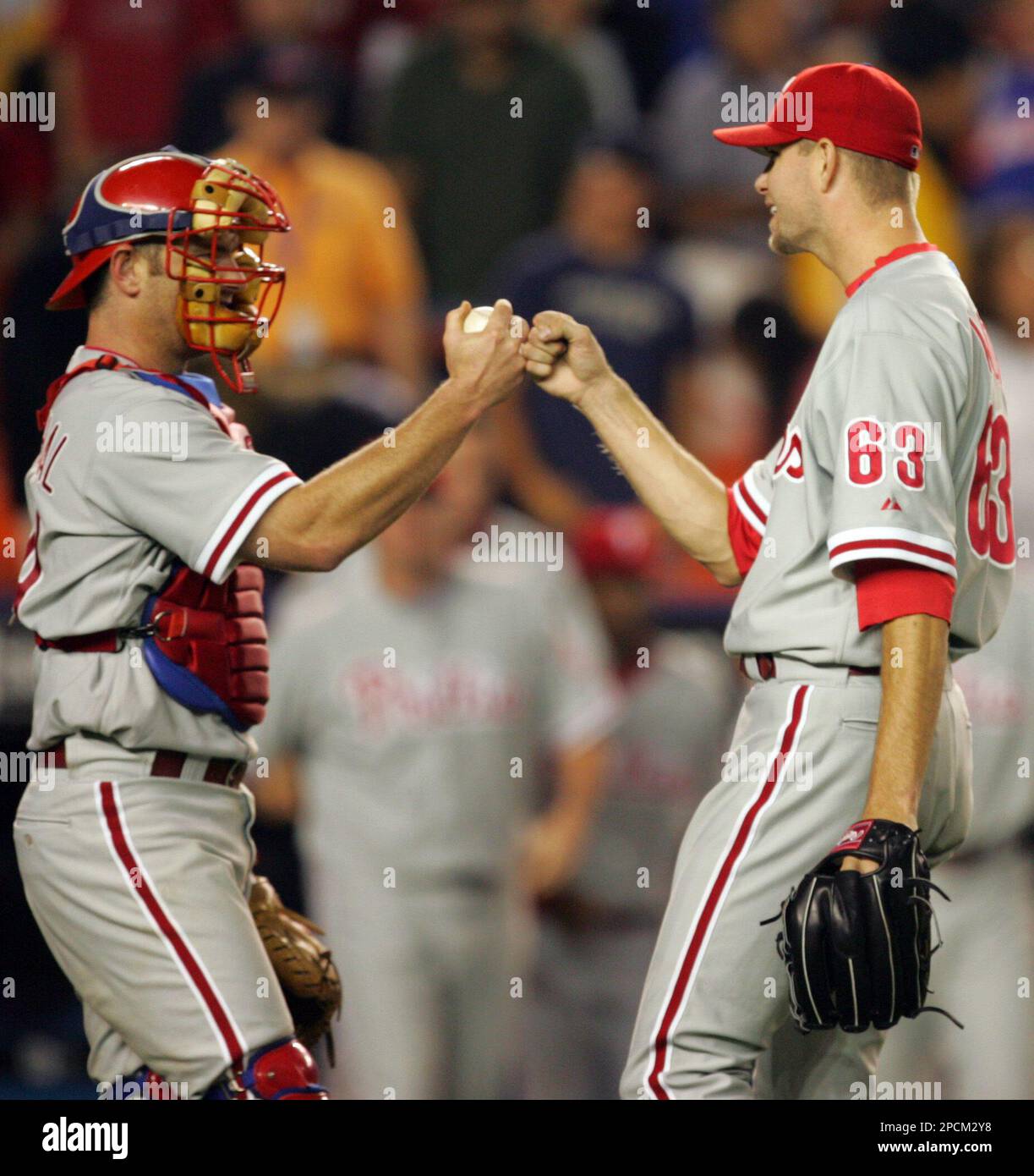 Philadelphia Phillies' Mike Lieberthal, left, congratulates pitcher ...