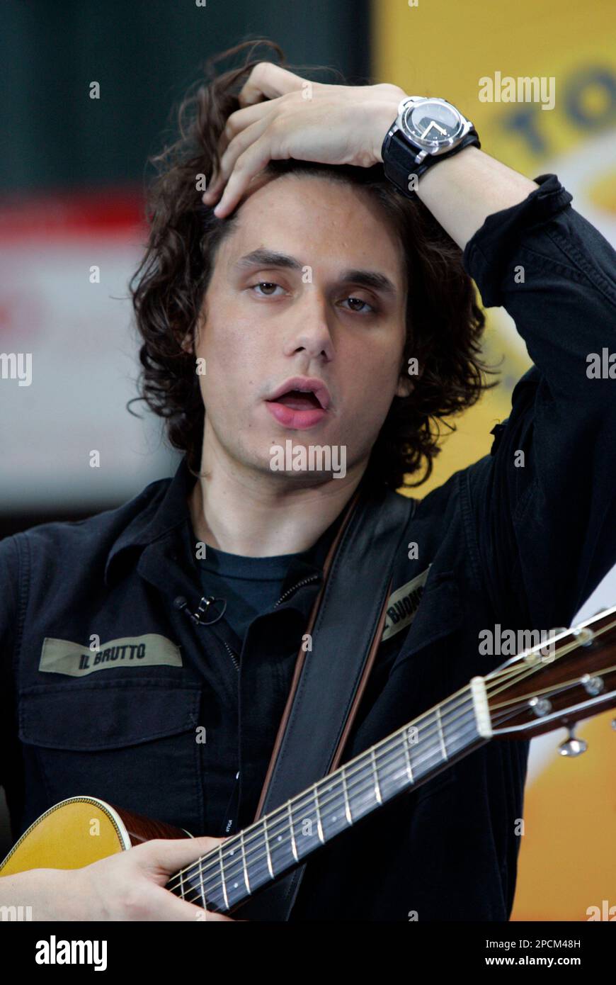 Singer John Mayer rearranges his hair during his appearance on the NBC ...