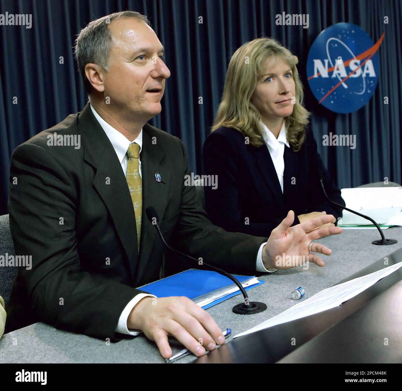 NASA Test Director Pete Nickolenko, left, and Shuttle Weather Officer ...