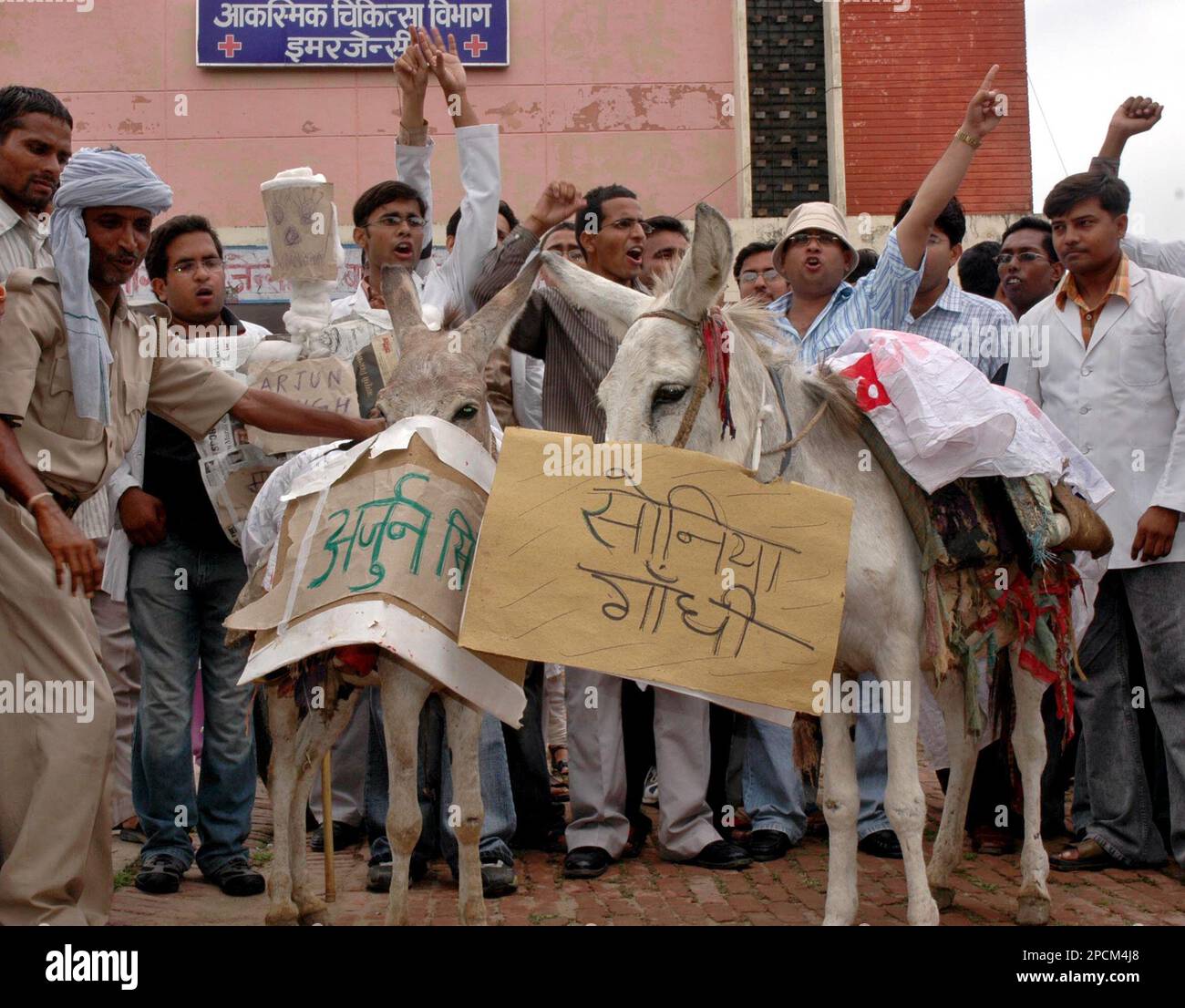 Agitating medical students of Motilal Nehru Medical College shout ...