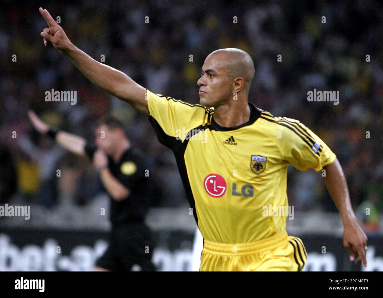 Julio Cesar of AEK Athens celebrates after scoring with a penalty ...