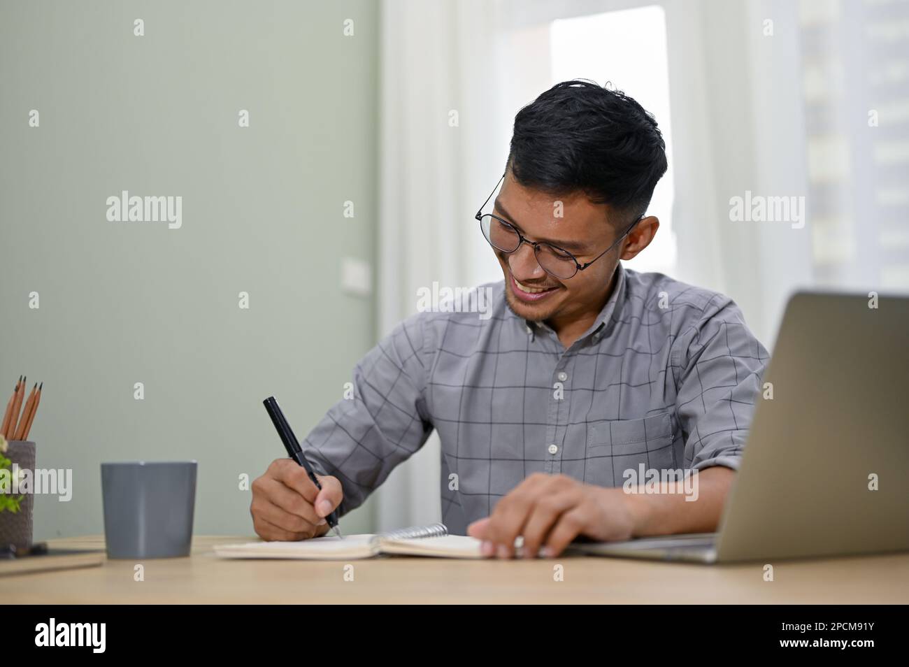 Professional happy millennial asian hi-res stock photography and images ...