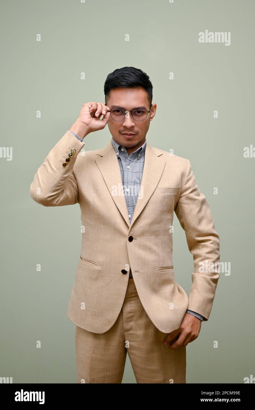 Portrait, Stressed and strict millennial Asian businessman or male boss ...