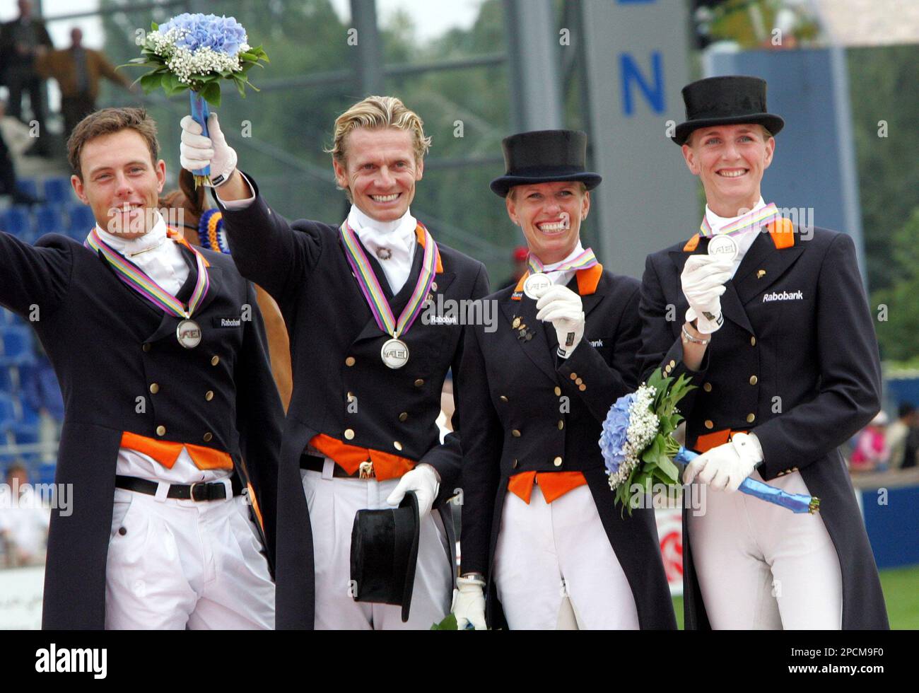 Netherlands' silver medal team of the World Team Dressage Championship ...