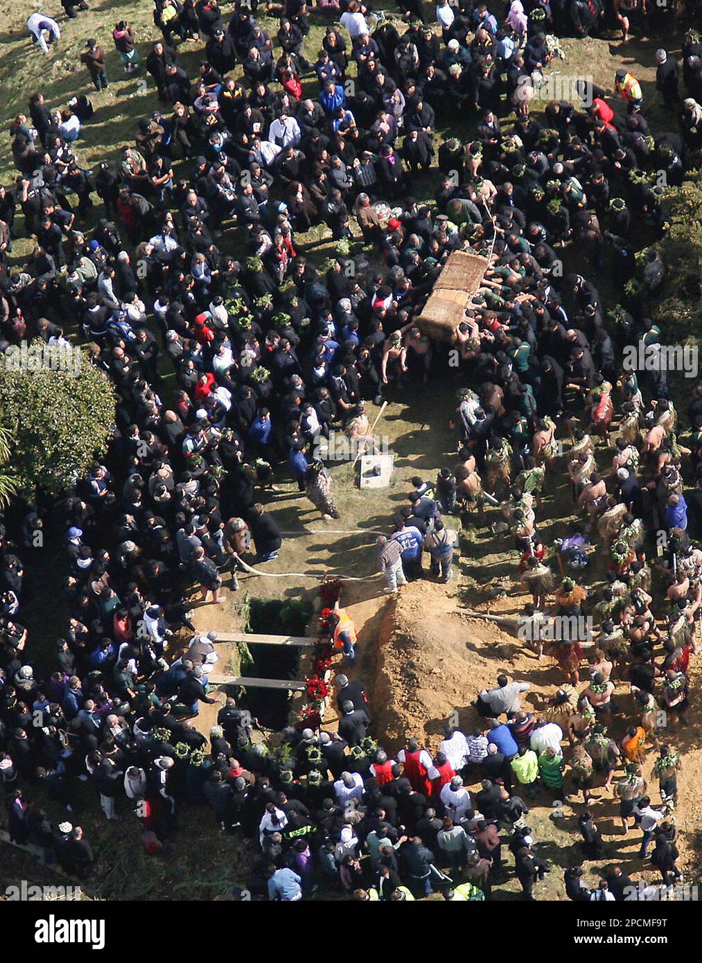 Maori warriors carry the coffin of Maori Queen Te Arikinui Dame Te ...