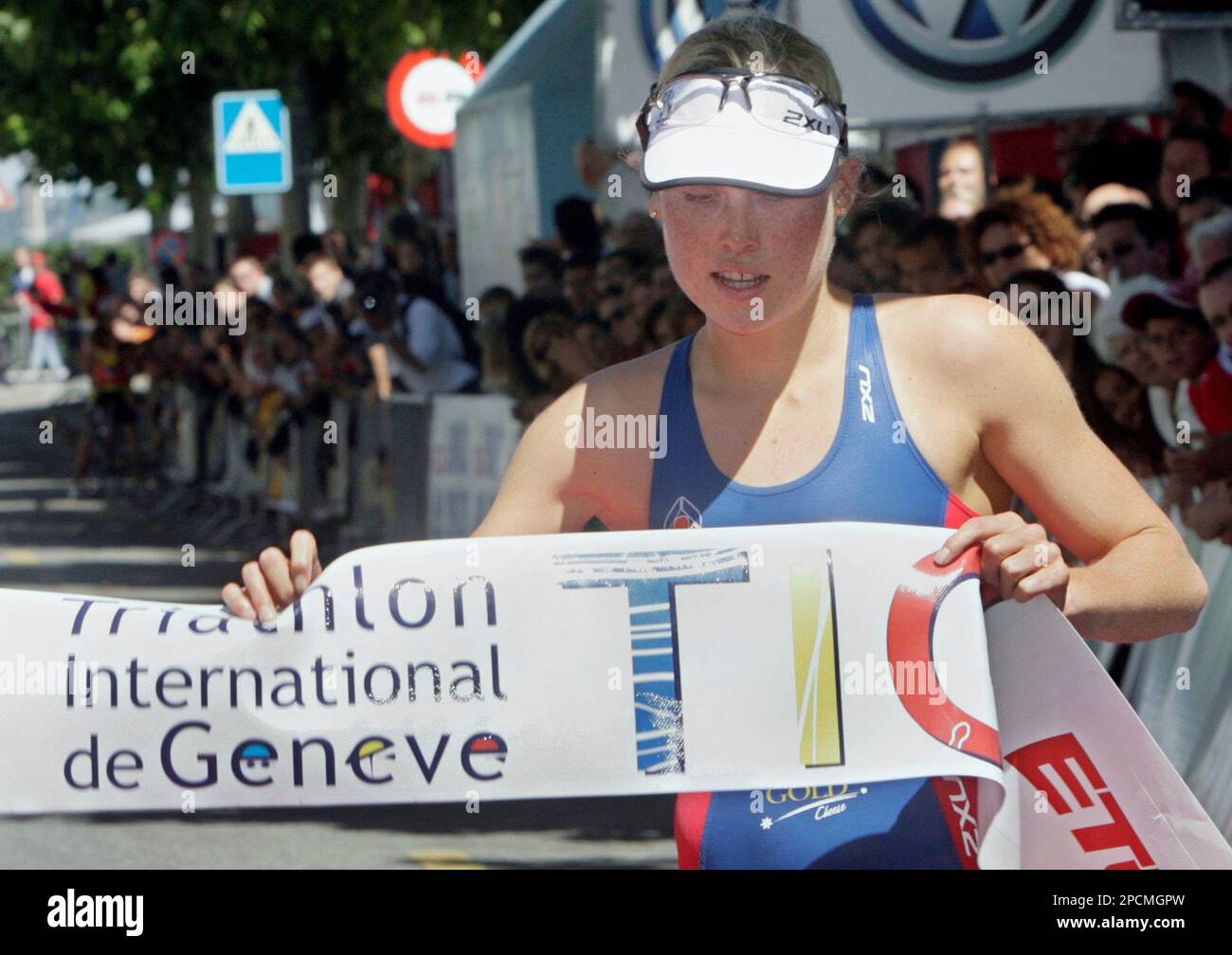 Felicity Abram of Australia crosses the finish line after winning the ...