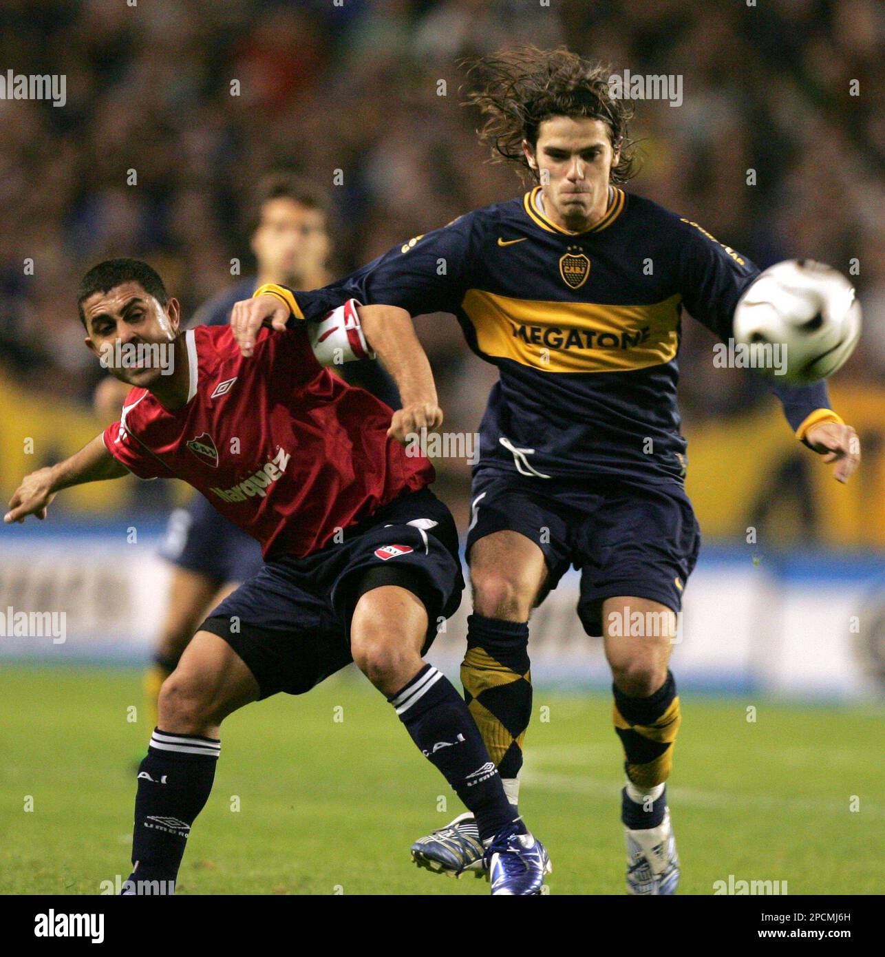 Boca Juniors' Fernando Gago, right, fights for the ball with ...