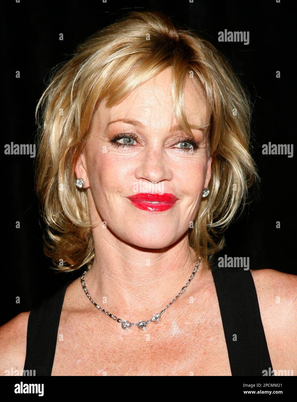Actress Melanie Griffith poses for photographers at the Imagen Awards ...